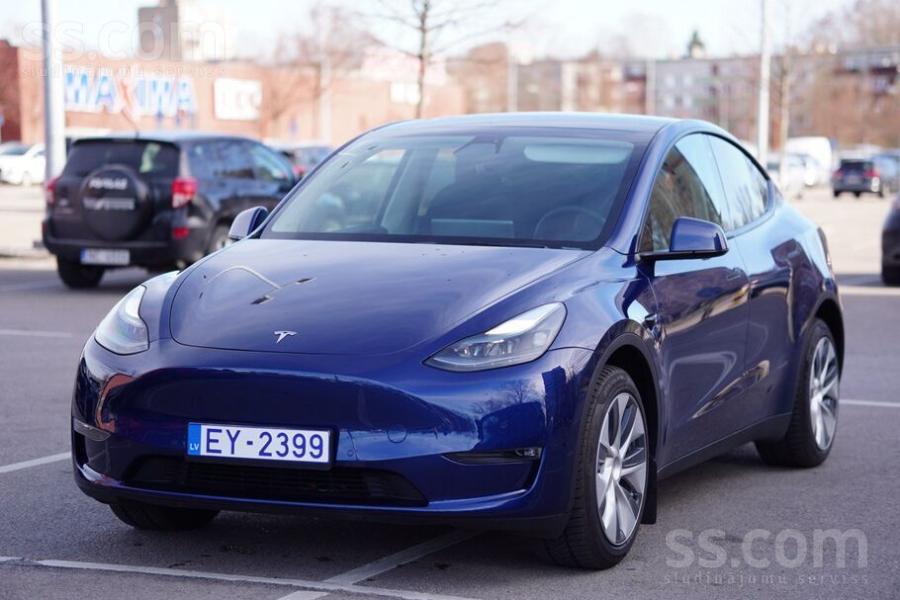 Blue Tesla Model Y 2022 in Riga, with an engine capacity of 0.00 L and mileage of 72 thousand km for 31999 €, photo 6 on AUTOMOTO.COM.LV