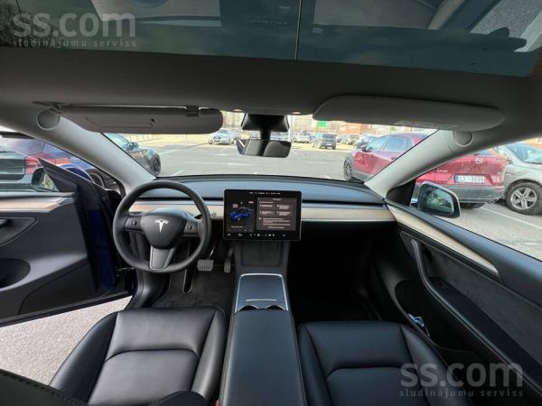 Blue Tesla Model Y 2022 in Riga, with an engine capacity of 0.00 L and mileage of 72 thousand km for 31999 €, photo 7 on AUTOMOTO.COM.LV