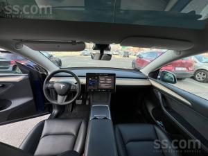Blue Tesla Model Y 2022 in Riga, with an engine capacity of 0.00 L and mileage of 72 thousand km for 31999 €, photo 8 on AUTOMOTO.COM.LV