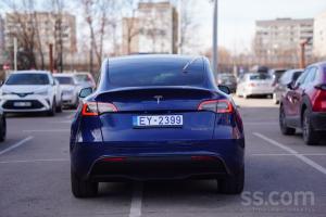 Blue Tesla Model Y 2022 in Riga, with an engine capacity of 0.00 L and mileage of 72 thousand km for 31999 €, photo 9 on AUTOMOTO.COM.LV