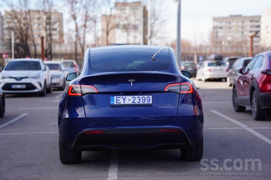 Blue Tesla Model Y 2022 in Riga, with an engine capacity of 0.00 L and mileage of 72 thousand km for 31999 €, photo 9 on AUTOMOTO.COM.LV