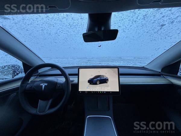 Blue Tesla Model Y 2023 in Riga, with an engine capacity of 0.00 L and mileage of 89 thousand km for 32499 €, photo 6 on AUTOMOTO.COM.LV