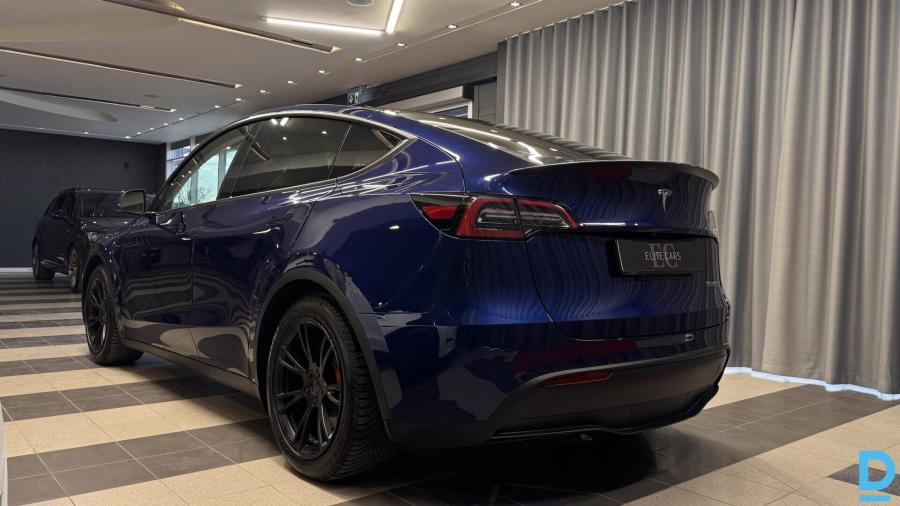 Blue Tesla Model Y 2023 in Marupe, with an engine capacity of 0.00 L and mileage of 60 thousand km for 35990 €, photo 3 on AUTOMOTO.COM.LV