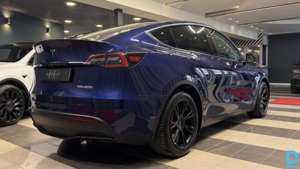 Blue Tesla Model Y 2023 in Marupe, with an engine capacity of 0.00 L and mileage of 60 thousand km for 35990 €, photo 4 on AUTOMOTO.COM.LV