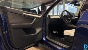 Blue Tesla Model Y 2023 in Marupe, with an engine capacity of 0.00 L and mileage of 60 thousand km for 35990 €, photo 5 on AUTOMOTO.COM.LV