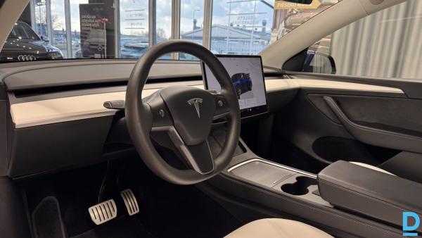 Blue Tesla Model Y 2023 in Marupe, with an engine capacity of 0.00 L and mileage of 60 thousand km for 35990 €, photo 6 on AUTOMOTO.COM.LV