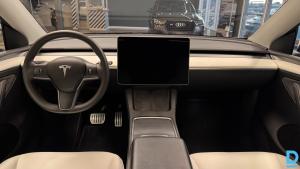 Blue Tesla Model Y 2023 in Marupe, with an engine capacity of 0.00 L and mileage of 60 thousand km for 35990 €, photo 10 on AUTOMOTO.COM.LV