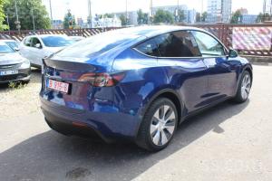 Blue Tesla Model Y 2023 in Liepaja, with an engine capacity of 0.00 L and mileage of 190 thousand km for 26500 €, photo 5 on AUTOMOTO.COM.LV