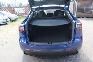 Blue Tesla Model Y 2023 in Liepaja, with an engine capacity of 0.00 L and mileage of 190 thousand km for 26500 €, photo 6 on AUTOMOTO.COM.LV