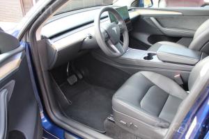 Blue Tesla Model Y 2023 in Liepaja, with an engine capacity of 0.00 L and mileage of 190 thousand km for 26500 €, photo 7 on AUTOMOTO.COM.LV
