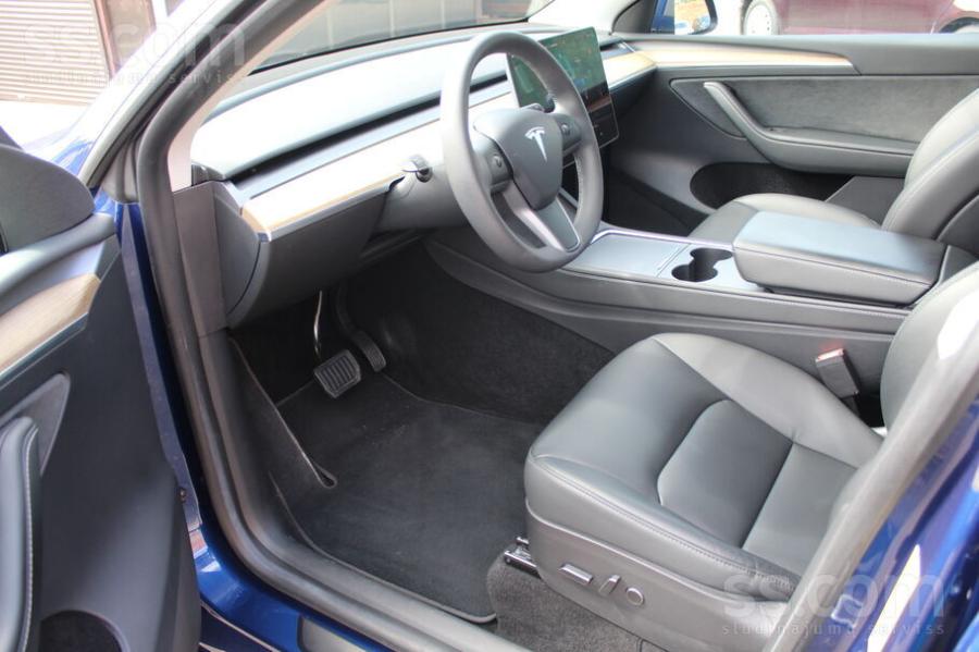 Blue Tesla Model Y 2023 in Liepaja, with an engine capacity of 0.00 L and mileage of 190 thousand km for 26500 €, photo 7 on AUTOMOTO.COM.LV
