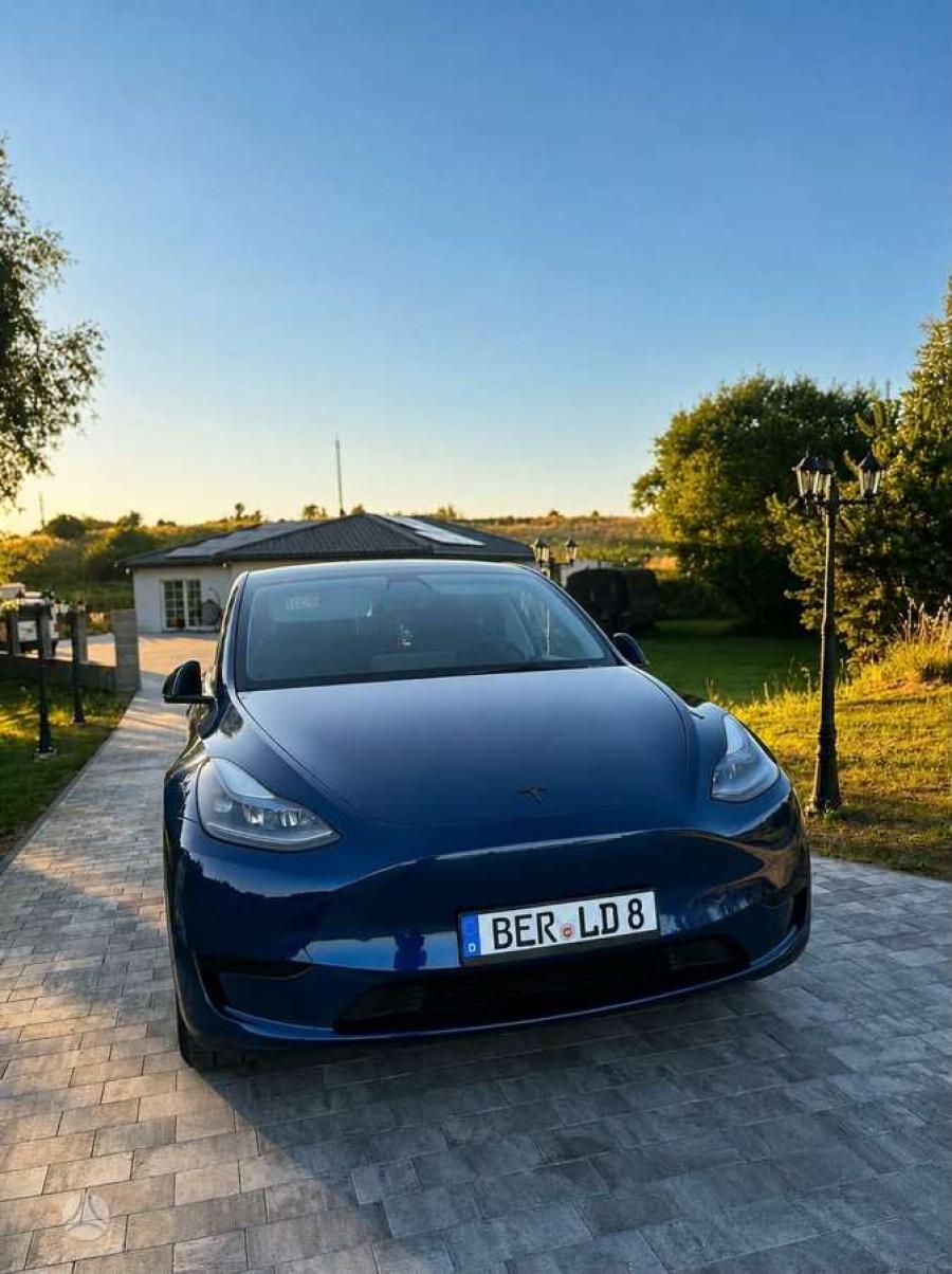Blue Tesla Model Y 2023 in Vilnius, with an engine capacity of 0.00 L and mileage of 72 thousand km for 25700 €, photo 1 on AUTOMOTO.COM.LV