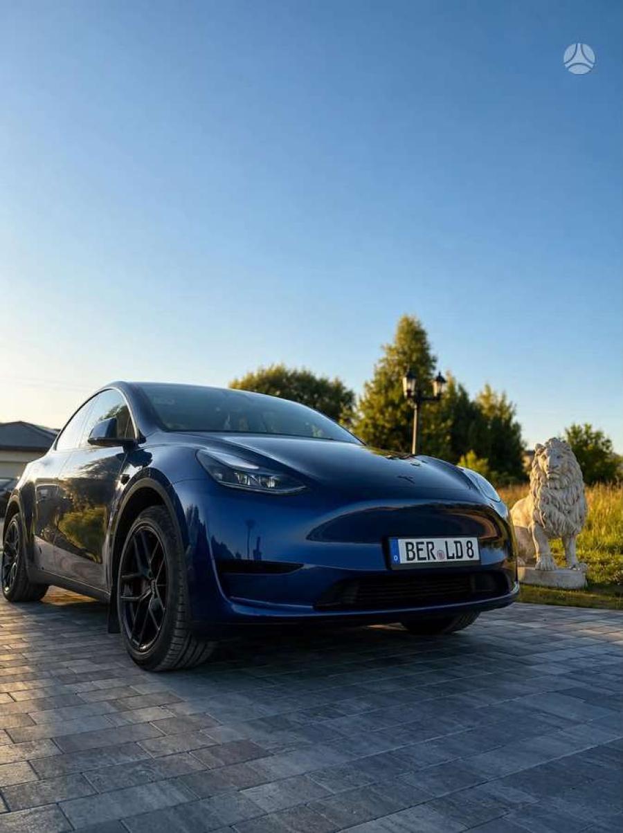 Blue Tesla Model Y 2023 in Vilnius, with an engine capacity of 0.00 L and mileage of 72 thousand km for 25700 €, photo 4 on AUTOMOTO.COM.LV