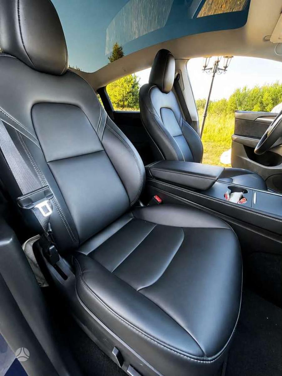 Blue Tesla Model Y 2023 in Vilnius, with an engine capacity of 0.00 L and mileage of 72 thousand km for 25700 €, photo 7 on AUTOMOTO.COM.LV