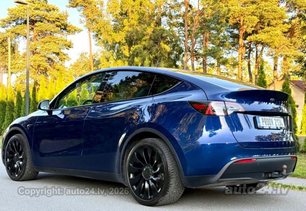 Blue Tesla Model Y 2023 in Tallinn, with an engine capacity of 0.00 L and mileage of 59 thousand km for 36500 €, photo 6 on AUTOMOTO.COM.LV