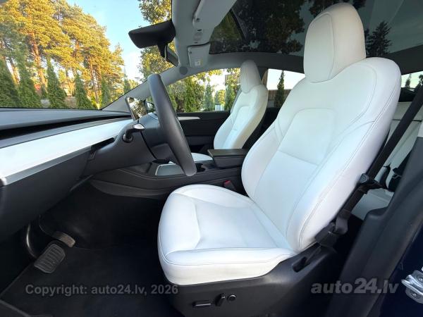 Blue Tesla Model Y 2023 in Tallinn, with an engine capacity of 0.00 L and mileage of 59 thousand km for 36500 €, photo 8 on AUTOMOTO.COM.LV