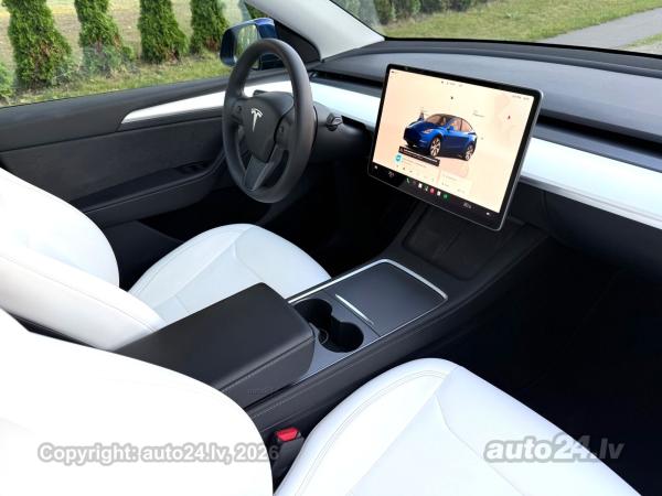 Blue Tesla Model Y 2023 in Tallinn, with an engine capacity of 0.00 L and mileage of 59 thousand km for 36500 €, photo 10 on AUTOMOTO.COM.LV