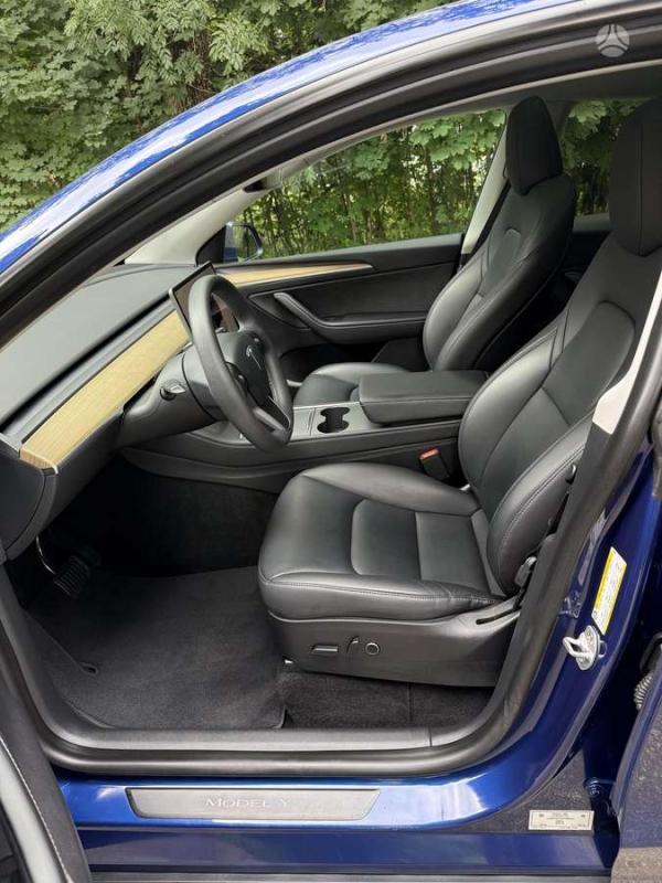 Blue Tesla Model Y 2023 in Marijampole, with an engine capacity of 0.00 L and mileage of 77 thousand km for 28500 €, photo 10 on AUTOMOTO.COM.LV
