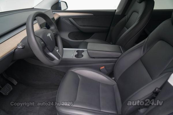 Blue Tesla Model Y 2024 in Tallinn, with an engine capacity of 0.00 L and mileage of 50 thousand km for 42990 €, photo 7 on AUTOMOTO.COM.LV