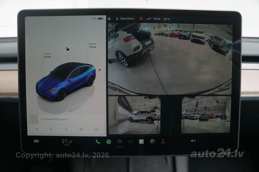 Blue Tesla Model Y 2024 in Tallinn, with an engine capacity of 0.00 L and mileage of 50 thousand km for 42990 €, photo 14 on AUTOMOTO.COM.LV
