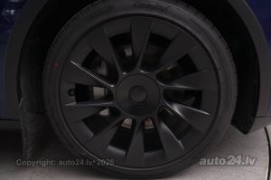 Blue Tesla Model Y 2024 in Tallinn, with an engine capacity of 0.00 L and mileage of 50 thousand km for 42990 €, photo 18 on AUTOMOTO.COM.LV
