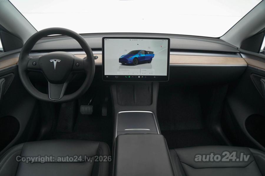 Blue Tesla Model Y 2024 in Tallinn, with an engine capacity of 0.00 L and mileage of 50 thousand km for 42990 €, photo 19 on AUTOMOTO.COM.LV