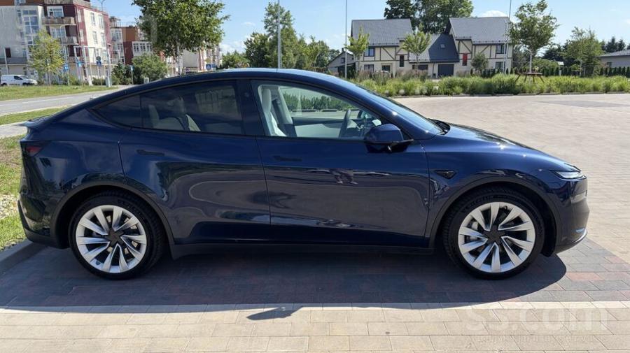 Blue Tesla Model Y 2026 in Riga, with an engine capacity of 0.00 L and mileage of 20 thousand km for 57000 €, photo 7 on AUTOMOTO.COM.LV