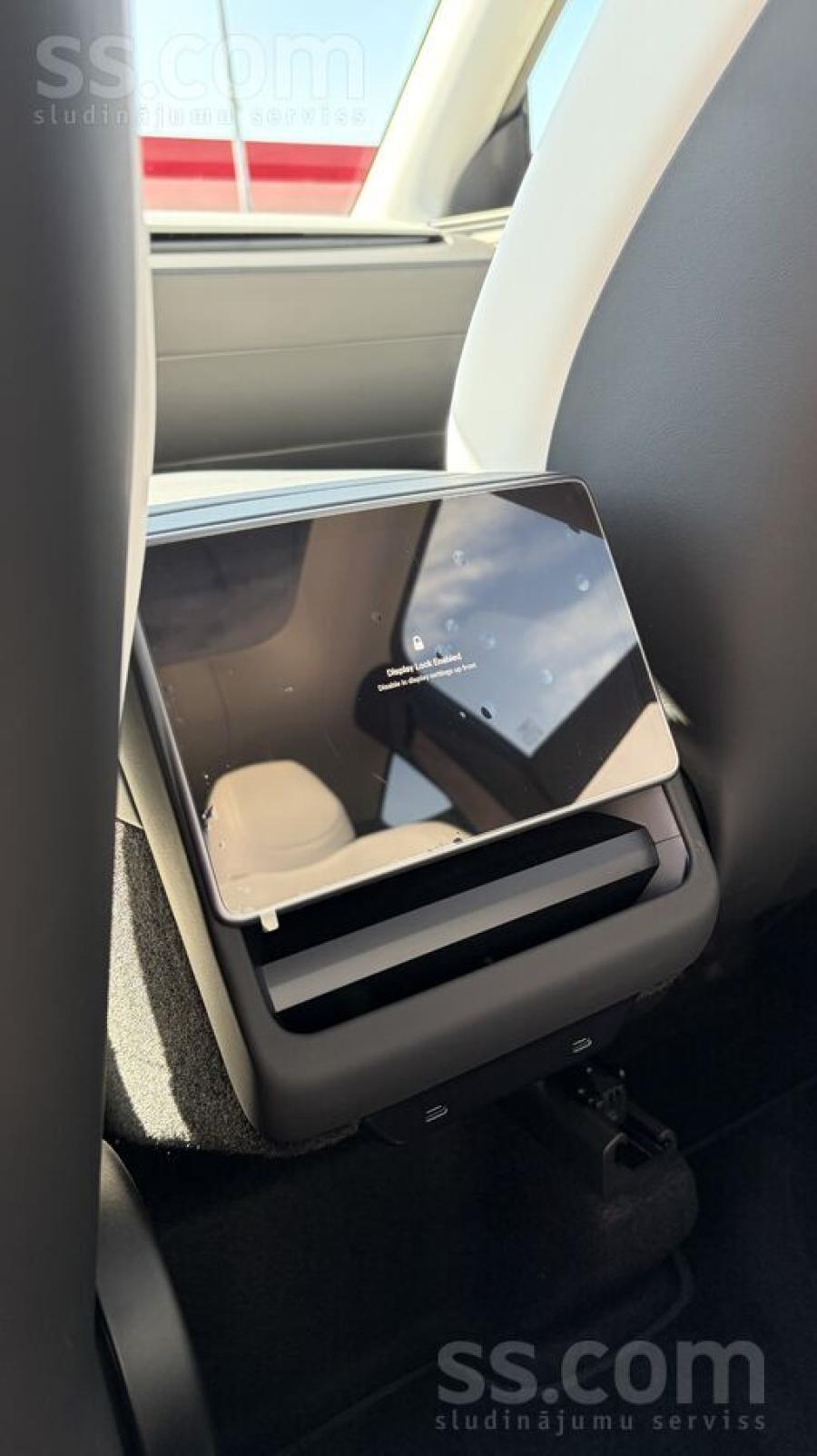 Blue Tesla Model Y 2026 in Riga, with an engine capacity of 0.00 L and mileage of 20 thousand km for 57000 €, photo 10 on AUTOMOTO.COM.LV