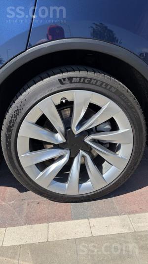 Blue Tesla Model Y 2026 in Riga, with an engine capacity of 0.00 L and mileage of 20 thousand km for 57000 €, photo 11 on AUTOMOTO.COM.LV