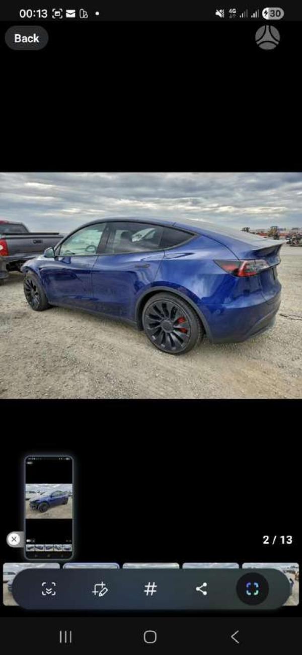 Blue Tesla Model Y 2022 in Klaipeda, with an engine capacity of 0.00 L and mileage of 34 thousand km for 18500 €, photo 2 on AUTOMOTO.COM.LV