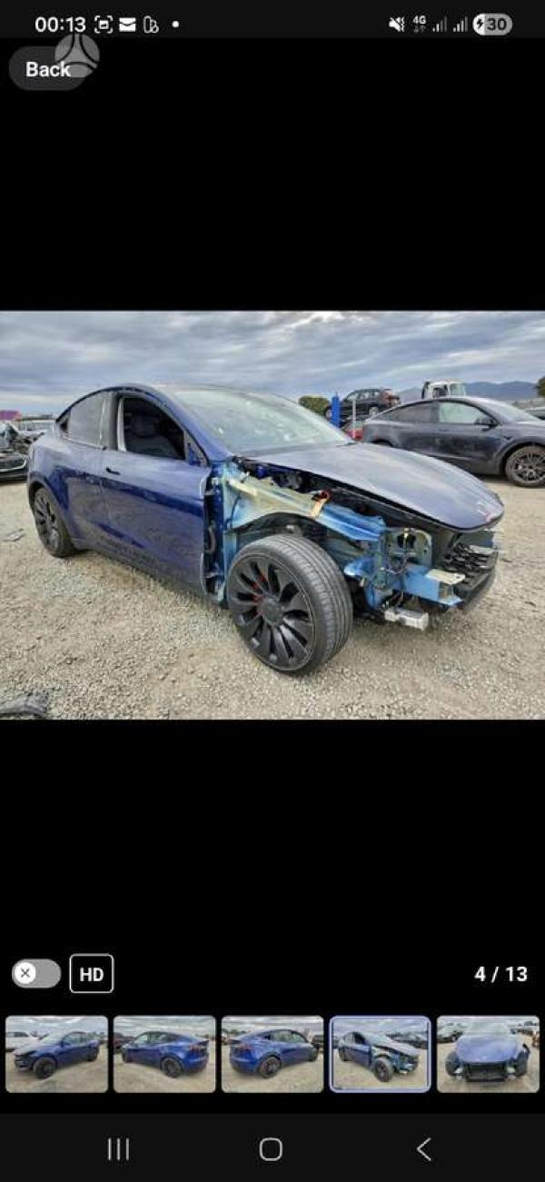 Blue Tesla Model Y 2022 in Klaipeda, with an engine capacity of 0.00 L and mileage of 34 thousand km for 18500 €, photo 4 on AUTOMOTO.COM.LV