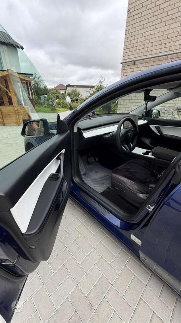 Blue Tesla Model Y 2020 in Kaunas, with an engine capacity of 0.00 L and mileage of 110 thousand km for 21000 €, photo 7 on AUTOMOTO.COM.LV