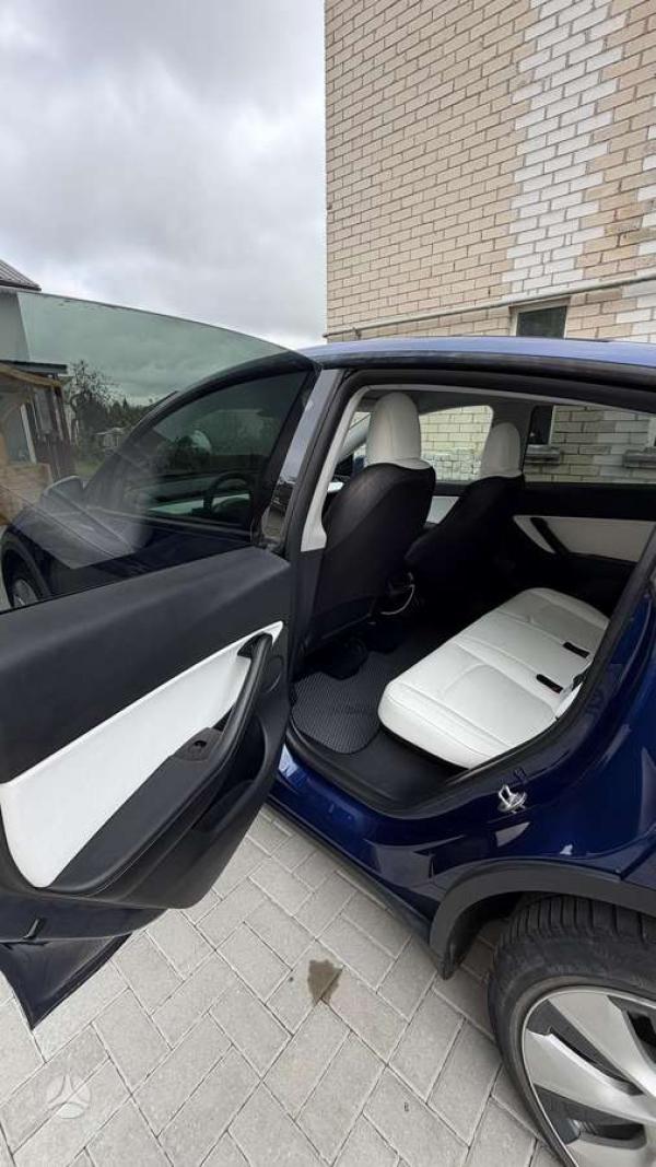 Blue Tesla Model Y 2020 in Kaunas, with an engine capacity of 0.00 L and mileage of 110 thousand km for 21000 €, photo 9 on AUTOMOTO.COM.LV