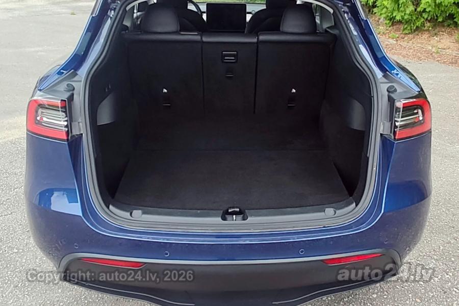 Blue Tesla Model Y 2022 in Tartu, with an engine capacity of 0.00 L and mileage of 107 thousand km for 32900 €, photo 14 on AUTOMOTO.COM.LV