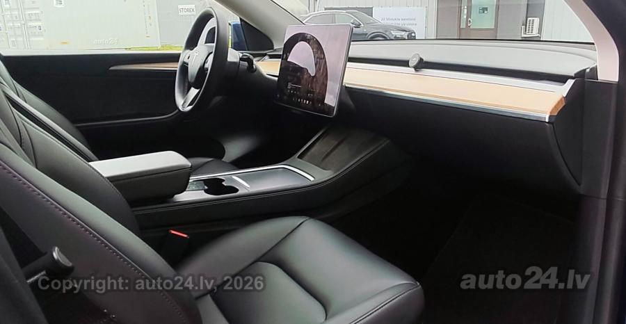 Blue Tesla Model Y 2022 in Tartu, with an engine capacity of 0.00 L and mileage of 107 thousand km for 32900 €, photo 22 on AUTOMOTO.COM.LV