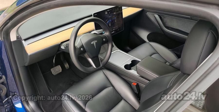 Blue Tesla Model Y 2022 in Tartu, with an engine capacity of 0.00 L and mileage of 107 thousand km for 32900 €, photo 19 on AUTOMOTO.COM.LV