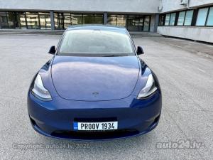 Blue Tesla Model Y 2023 in Tallinn, with an engine capacity of 0.00 L and mileage of 105 thousand km for 33800 €, photo 3 on AUTOMOTO.COM.LV