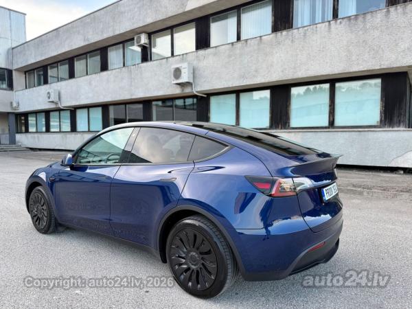 Blue Tesla Model Y 2023 in Tallinn, with an engine capacity of 0.00 L and mileage of 105 thousand km for 33800 €, photo 7 on AUTOMOTO.COM.LV