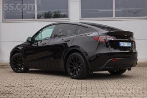 Brūns Tesla Model Y 2021 Rīga, ar dzinēja tilpumu 0.00 L un nobraukumu 0 tūkst. km par 34995 €, foto 6 vietnē AUTOMOTO.COM.LV