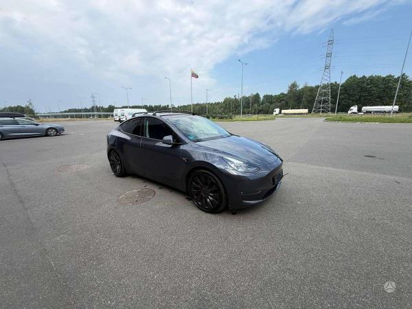 Tesla Model Y 2023 in Kaunas, with an engine capacity of 0.00 L and mileage of 59 thousand km for 28500 €, photo 6 on AUTOMOTO.COM.LV