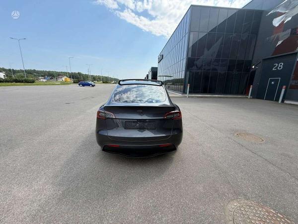 Tesla Model Y 2023 in Kaunas, with an engine capacity of 0.00 L and mileage of 59 thousand km for 28500 €, photo 7 on AUTOMOTO.COM.LV