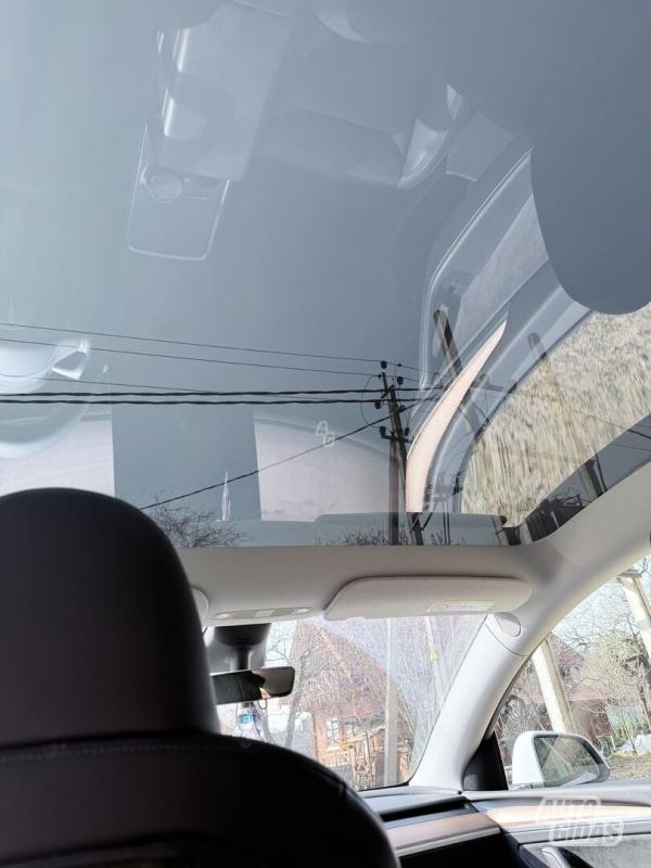 Tesla Model Y 2024 in Vilnius, with an engine capacity of 0.00 L and mileage of 55 thousand km for 29999 €, photo 6 on AUTOMOTO.COM.LV