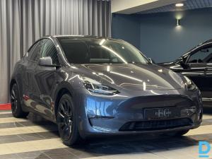 Grey Tesla Model Y 2021 in Marupe, with an engine capacity of 0.00 L and mileage of 105 thousand km for 27990 €, photo 2 on AUTOMOTO.COM.LV