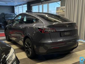Grey Tesla Model Y 2021 in Marupe, with an engine capacity of 0.00 L and mileage of 105 thousand km for 27990 €, photo 3 on AUTOMOTO.COM.LV