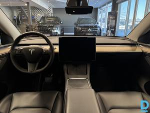 Grey Tesla Model Y 2021 in Marupe, with an engine capacity of 0.00 L and mileage of 105 thousand km for 27990 €, photo 7 on AUTOMOTO.COM.LV