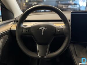 Grey Tesla Model Y 2021 in Marupe, with an engine capacity of 0.00 L and mileage of 105 thousand km for 27990 €, photo 8 on AUTOMOTO.COM.LV