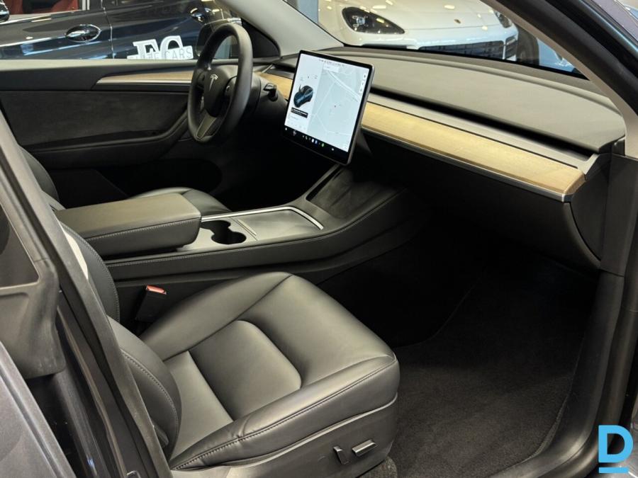 Grey Tesla Model Y 2021 in Marupe, with an engine capacity of 0.00 L and mileage of 105 thousand km for 27990 €, photo 10 on AUTOMOTO.COM.LV