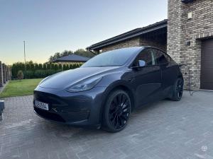 Grey Tesla Model Y 2021 in Vilnius, with an engine capacity of 0.00 L and mileage of 52 thousand km for 27700 €, photo  on AUTOMOTO.COM.LV