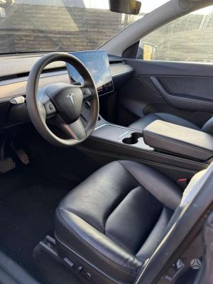 Grey Tesla Model Y 2021 in Vilnius, with an engine capacity of 0.00 L and mileage of 52 thousand km for 27700 €, photo 9 on AUTOMOTO.COM.LV