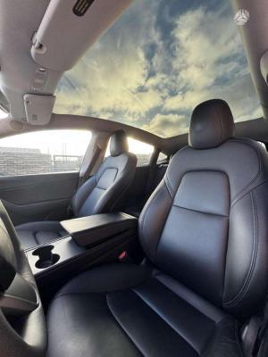 Grey Tesla Model Y 2021 in Vilnius, with an engine capacity of 0.00 L and mileage of 52 thousand km for 27700 €, photo 10 on AUTOMOTO.COM.LV